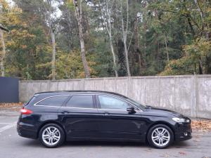 Black Ford Mondeo 2016 in Vilnius, with an engine capacity of 2.00 L and mileage of 266 thousand km for 6700 €, photo 8 on AUTOMOTO.COM.LV