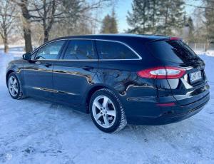 Black Ford Mondeo 2017 in Radviliskis, with an engine capacity of 2.00 L and mileage of 316 thousand km for 5990 €, photo 11 on AUTOMOTO.COM.LV