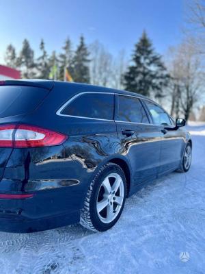 Black Ford Mondeo 2017 in Radviliskis, with an engine capacity of 2.00 L and mileage of 316 thousand km for 5990 €, photo 15 on AUTOMOTO.COM.LV