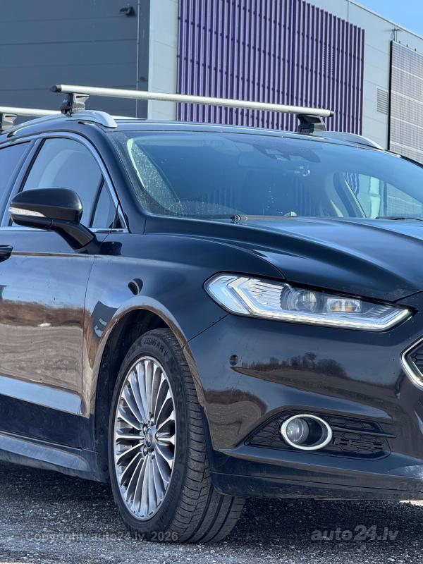 Black Ford Mondeo 2017 in Tartu, with an engine capacity of 2.00 L and mileage of 214 thousand km for 10999 €, photo 4 on AUTOMOTO.COM.LV