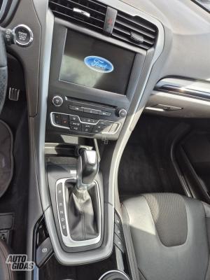 Black Ford Mondeo 2017 in Kaunas, with an engine capacity of 2.00 L and mileage of 194 thousand km for 7950 €, photo 14 on AUTOMOTO.COM.LV