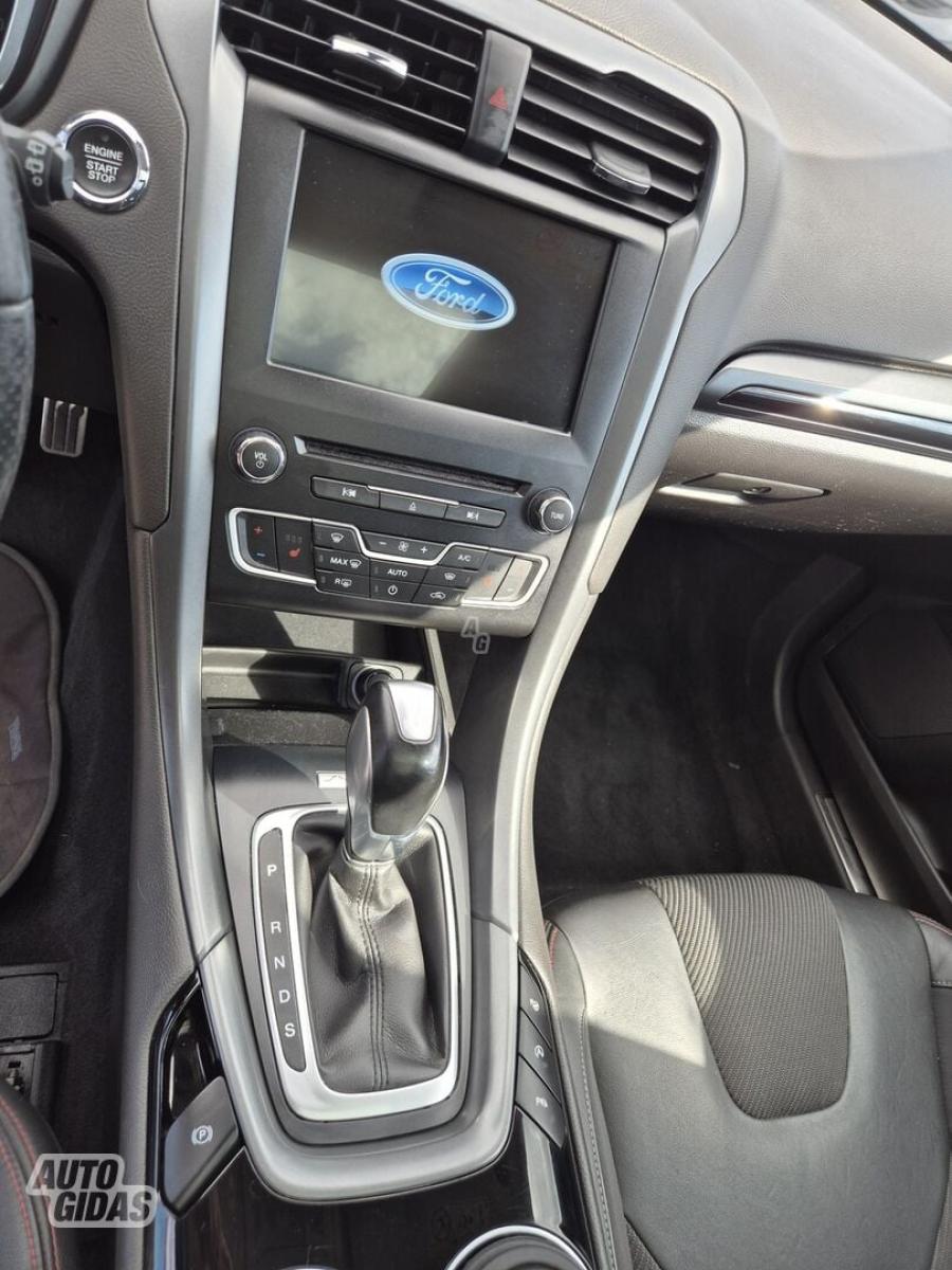 Black Ford Mondeo 2017 in Kaunas, with an engine capacity of 2.00 L and mileage of 194 thousand km for 7950 €, photo 14 on AUTOMOTO.COM.LV
