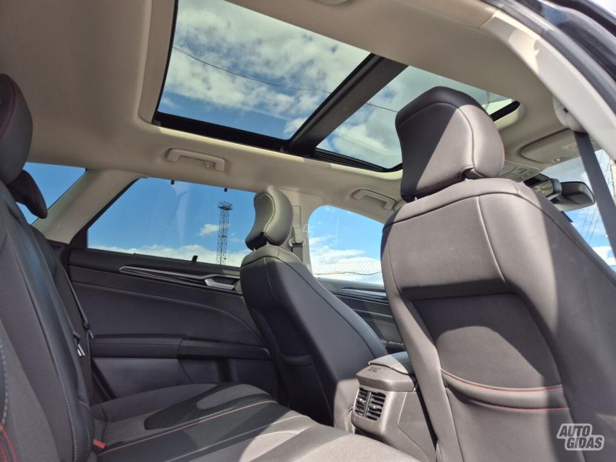 Black Ford Mondeo 2017 in Kaunas, with an engine capacity of 2.00 L and mileage of 194 thousand km for 7950 €, photo 23 on AUTOMOTO.COM.LV