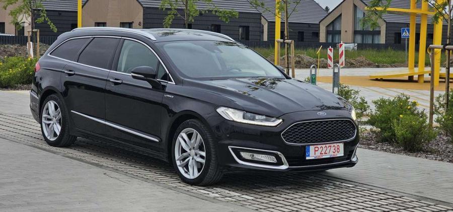 Black Ford Mondeo 2017 in Klaipeda, with an engine capacity of 2.00 L and mileage of 212 thousand km for 9799 €, photo 5 on AUTOMOTO.COM.LV