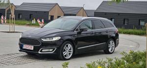 Black Ford Mondeo 2017 in Klaipeda, with an engine capacity of 2.00 L and mileage of 212 thousand km for 9799 €, photo 6 on AUTOMOTO.COM.LV