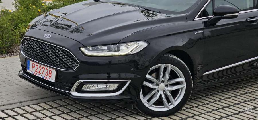 Black Ford Mondeo 2017 in Klaipeda, with an engine capacity of 2.00 L and mileage of 212 thousand km for 9799 €, photo 11 on AUTOMOTO.COM.LV