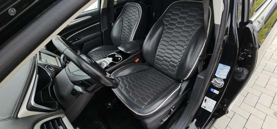 Black Ford Mondeo 2017 in Klaipeda, with an engine capacity of 2.00 L and mileage of 212 thousand km for 9799 €, photo 12 on AUTOMOTO.COM.LV
