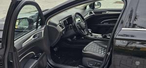 Black Ford Mondeo 2017 in Klaipeda, with an engine capacity of 2.00 L and mileage of 212 thousand km for 9799 €, photo 13 on AUTOMOTO.COM.LV
