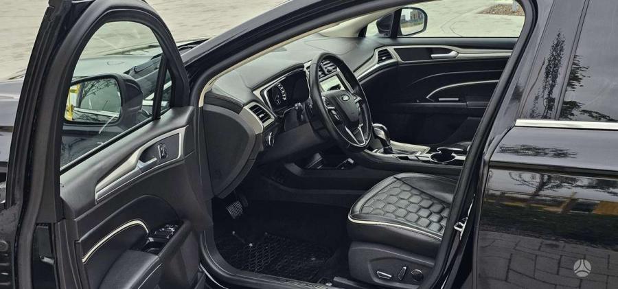 Black Ford Mondeo 2017 in Klaipeda, with an engine capacity of 2.00 L and mileage of 212 thousand km for 9799 €, photo 13 on AUTOMOTO.COM.LV