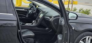 Black Ford Mondeo 2017 in Klaipeda, with an engine capacity of 2.00 L and mileage of 212 thousand km for 9799 €, photo 16 on AUTOMOTO.COM.LV