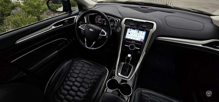Black Ford Mondeo 2017 in Klaipeda, with an engine capacity of 2.00 L and mileage of 212 thousand km for 9799 €, photo 22 on AUTOMOTO.COM.LV