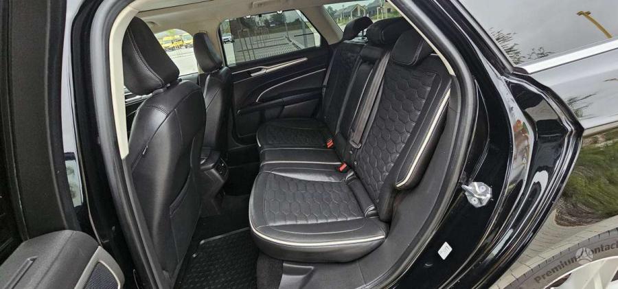 Black Ford Mondeo 2017 in Klaipeda, with an engine capacity of 2.00 L and mileage of 212 thousand km for 9799 €, photo 23 on AUTOMOTO.COM.LV
