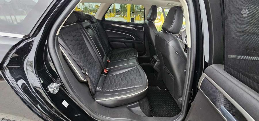 Black Ford Mondeo 2017 in Klaipeda, with an engine capacity of 2.00 L and mileage of 212 thousand km for 9799 €, photo 24 on AUTOMOTO.COM.LV