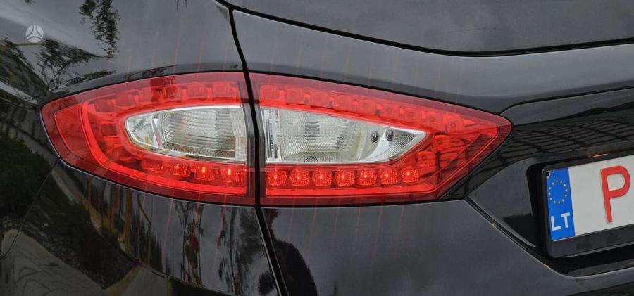 Black Ford Mondeo 2017 in Klaipeda, with an engine capacity of 2.00 L and mileage of 212 thousand km for 9799 €, photo 28 on AUTOMOTO.COM.LV