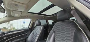 Black Ford Mondeo 2017 in Klaipeda, with an engine capacity of 2.00 L and mileage of 212 thousand km for 9799 €, photo 30 on AUTOMOTO.COM.LV