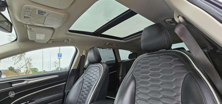Black Ford Mondeo 2017 in Klaipeda, with an engine capacity of 2.00 L and mileage of 212 thousand km for 9799 €, photo 30 on AUTOMOTO.COM.LV