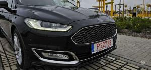 Black Ford Mondeo 2017 in Klaipeda, with an engine capacity of 2.00 L and mileage of 212 thousand km for 9799 €, photo 32 on AUTOMOTO.COM.LV