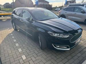 Black Ford Mondeo 2017 in Klaipeda, with an engine capacity of 2.00 L and mileage of 212 thousand km for 9799 €, photo 35 on AUTOMOTO.COM.LV