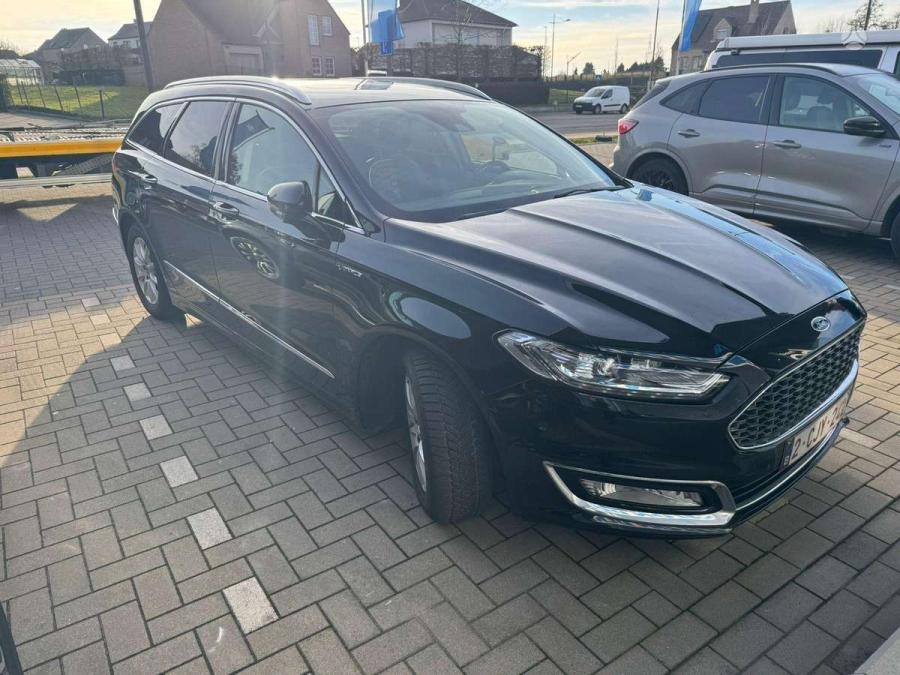 Black Ford Mondeo 2017 in Klaipeda, with an engine capacity of 2.00 L and mileage of 212 thousand km for 9799 €, photo 35 on AUTOMOTO.COM.LV