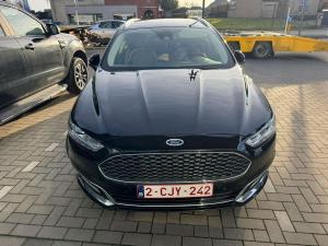 Black Ford Mondeo 2017 in Klaipeda, with an engine capacity of 2.00 L and mileage of 212 thousand km for 9799 €, photo 36 on AUTOMOTO.COM.LV