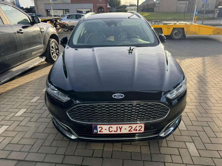 Black Ford Mondeo 2017 in Klaipeda, with an engine capacity of 2.00 L and mileage of 212 thousand km for 9799 €, photo 36 on AUTOMOTO.COM.LV