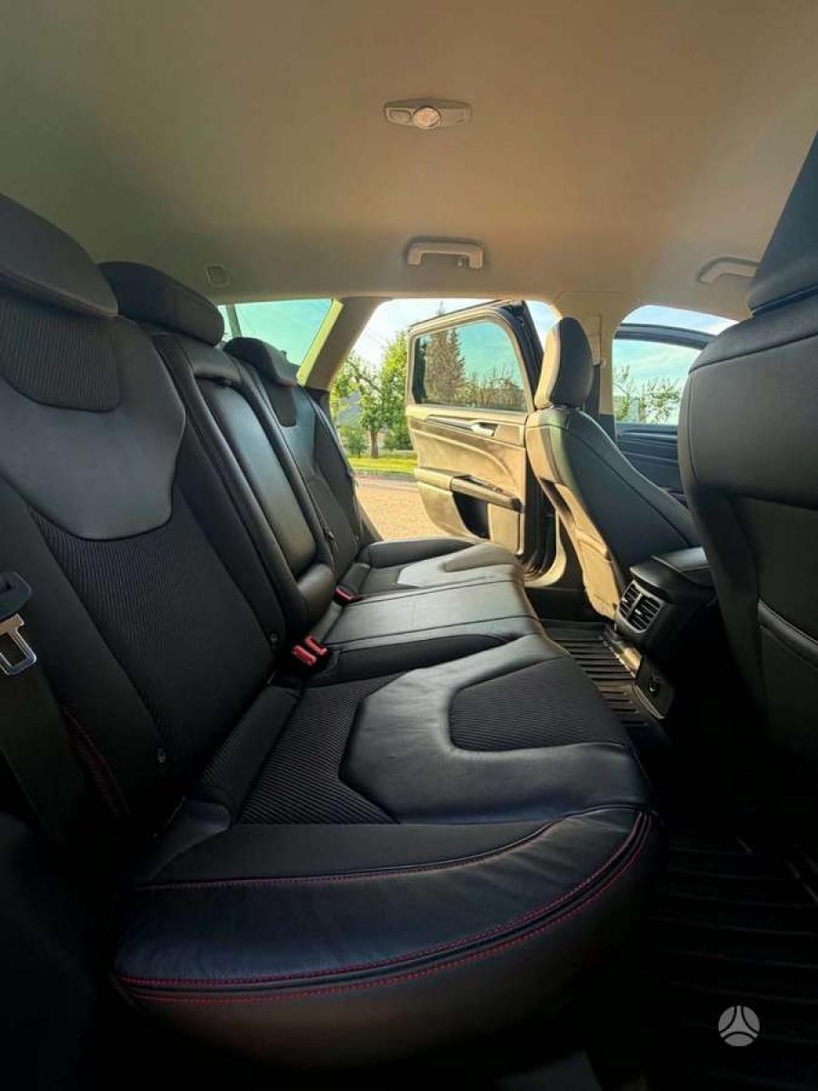 Black Ford Mondeo 2017 in Ukmerge, with an engine capacity of 2.00 L and mileage of 320 thousand km for 7750 €, photo 12 on AUTOMOTO.COM.LV