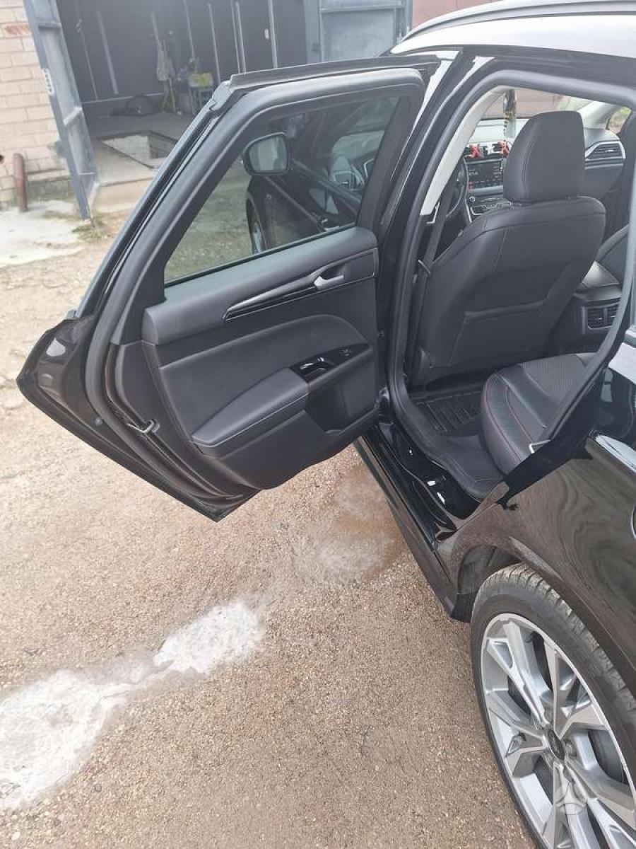 Black Ford Mondeo 2017 in Ukmerge, with an engine capacity of 2.00 L and mileage of 320 thousand km for 7750 €, photo 24 on AUTOMOTO.COM.LV