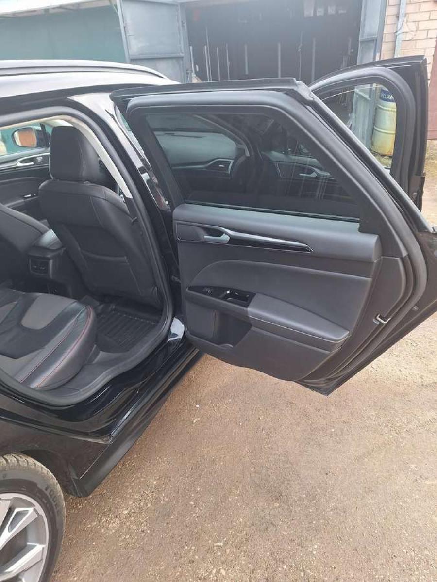 Black Ford Mondeo 2017 in Ukmerge, with an engine capacity of 2.00 L and mileage of 320 thousand km for 7750 €, photo 25 on AUTOMOTO.COM.LV