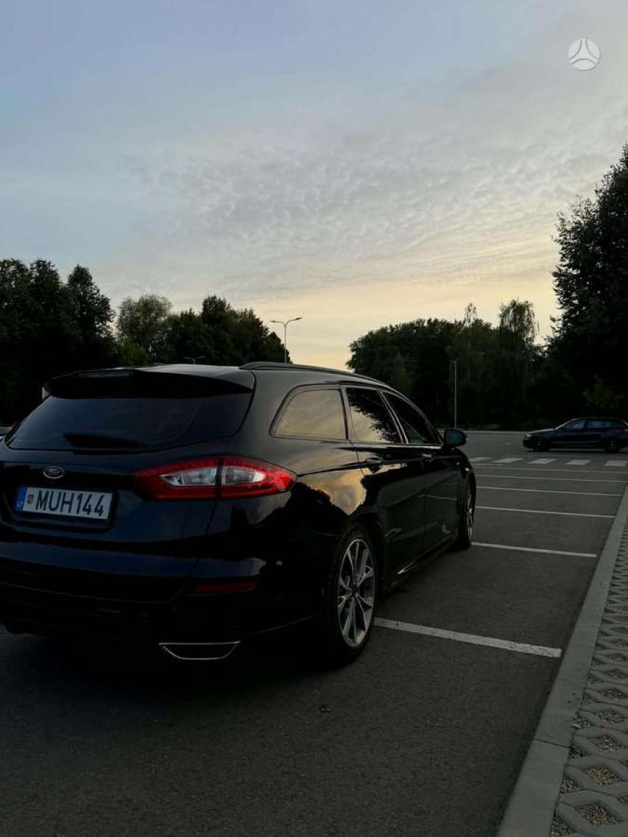 Black Ford Mondeo 2017 in Ukmerge, with an engine capacity of 2.00 L and mileage of 320 thousand km for 7750 €, photo 13 on AUTOMOTO.COM.LV