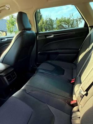 Black Ford Mondeo 2017 in Ukmerge, with an engine capacity of 2.00 L and mileage of 320 thousand km for 7750 €, photo 18 on AUTOMOTO.COM.LV