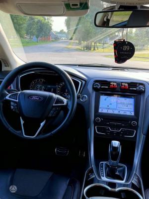 Black Ford Mondeo 2017 in Ukmerge, with an engine capacity of 2.00 L and mileage of 320 thousand km for 7750 €, photo 19 on AUTOMOTO.COM.LV