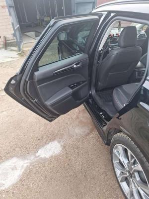 Black Ford Mondeo 2017 in Ukmerge, with an engine capacity of 2.00 L and mileage of 320 thousand km for 7750 €, photo 24 on AUTOMOTO.COM.LV