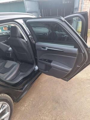 Black Ford Mondeo 2017 in Ukmerge, with an engine capacity of 2.00 L and mileage of 320 thousand km for 7750 €, photo 25 on AUTOMOTO.COM.LV