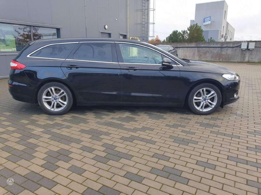 Black Ford Mondeo 2018 in Siauliai, with an engine capacity of 2.00 L and mileage of 230 thousand km for 9900 €, photo 7 on AUTOMOTO.COM.LV