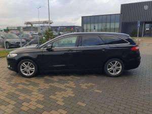 Black Ford Mondeo 2018 in Siauliai, with an engine capacity of 2.00 L and mileage of 230 thousand km for 9900 €, photo 8 on AUTOMOTO.COM.LV