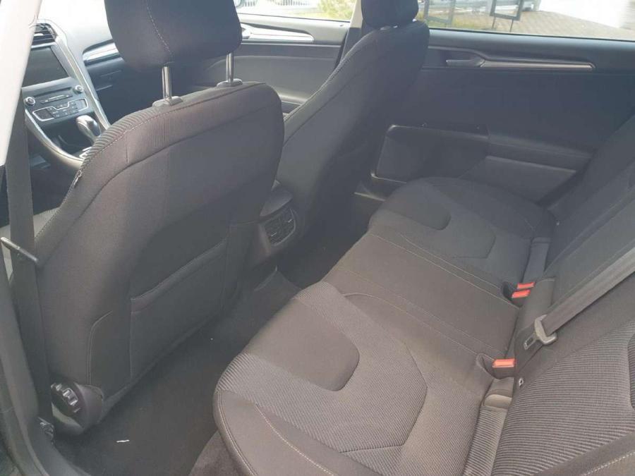 Black Ford Mondeo 2018 in Siauliai, with an engine capacity of 2.00 L and mileage of 230 thousand km for 9900 €, photo 21 on AUTOMOTO.COM.LV