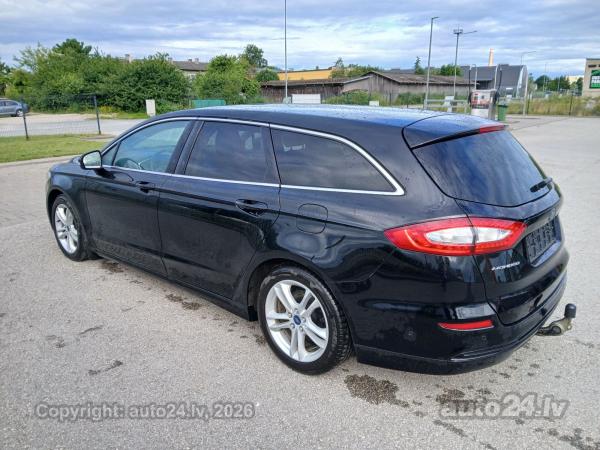 Black Ford Mondeo 2018 in Rakvere, with an engine capacity of 2.00 L and mileage of 283 thousand km for 9990 €, photo 4 on AUTOMOTO.COM.LV