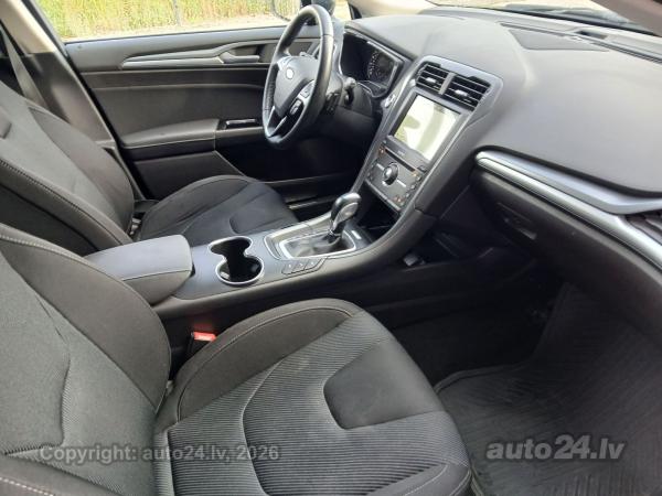 Black Ford Mondeo 2018 in Rakvere, with an engine capacity of 2.00 L and mileage of 283 thousand km for 9990 €, photo 9 on AUTOMOTO.COM.LV
