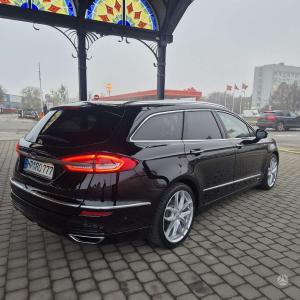 Black Ford Mondeo 2019 in Kaunas, with an engine capacity of 2.00 L and mileage of 267 thousand km for 12450 €, photo 5 on AUTOMOTO.COM.LV