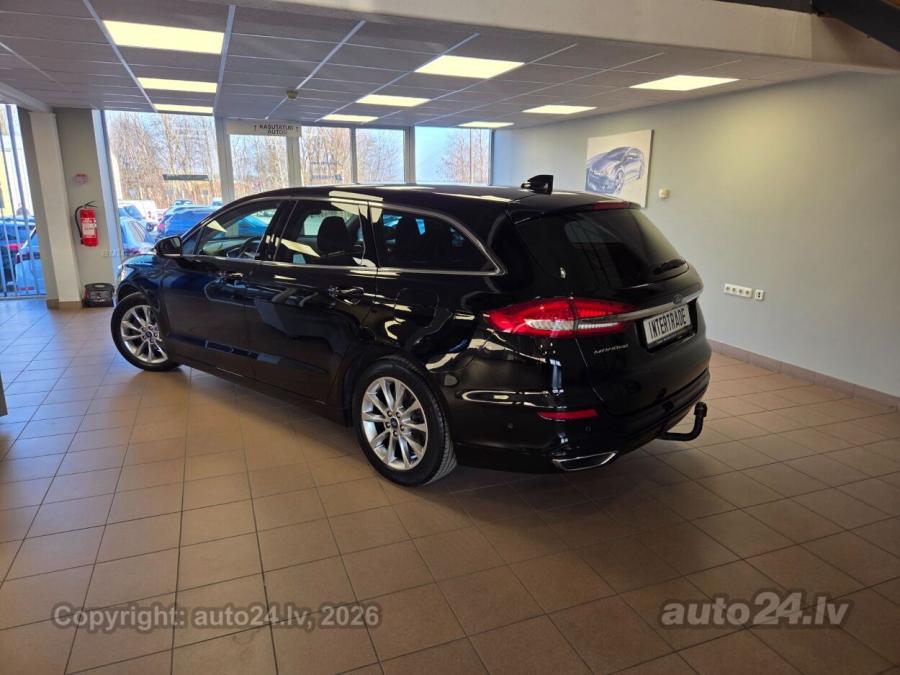 Black Ford Mondeo 2020 in Tartu, with an engine capacity of 2.00 L and mileage of 193 thousand km for 12990 €, photo 3 on AUTOMOTO.COM.LV