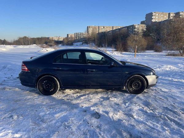 Blue Ford Mondeo 2007 in Vilnius, with an engine capacity of 2.00 L and mileage of 301 thousand km for 920 €, photo 3 on AUTOMOTO.COM.LV