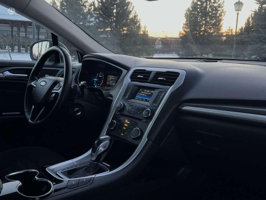 Blue Ford Mondeo 2016 in Panevezys, with an engine capacity of 2.00 L and mileage of 308 thousand km for 6500 €, photo 8 on AUTOMOTO.COM.LV