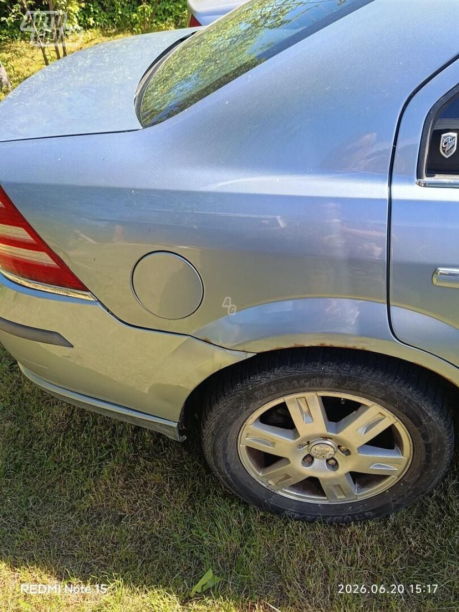 Blue Ford Mondeo 2006 in Vilnius, with an engine capacity of 2.00 L and mileage of 200 thousand km for 700 €, photo 9 on AUTOMOTO.COM.LV