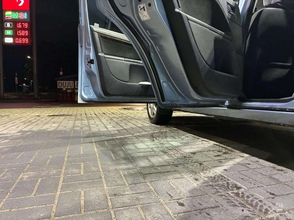 Blue Ford Mondeo 2006 in Vilnius, with an engine capacity of 2.00 L and mileage of 275 thousand km for 650 €, photo 7 on AUTOMOTO.COM.LV