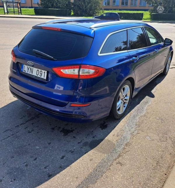Blue Ford Mondeo 2015 in Ukmerge, with an engine capacity of 2.00 L and mileage of 266 thousand km for 7790 €, photo 1 on AUTOMOTO.COM.LV