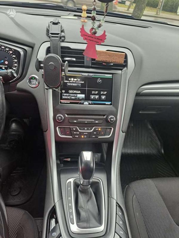 Blue Ford Mondeo 2015 in Ukmerge, with an engine capacity of 2.00 L and mileage of 266 thousand km for 7790 €, photo 6 on AUTOMOTO.COM.LV
