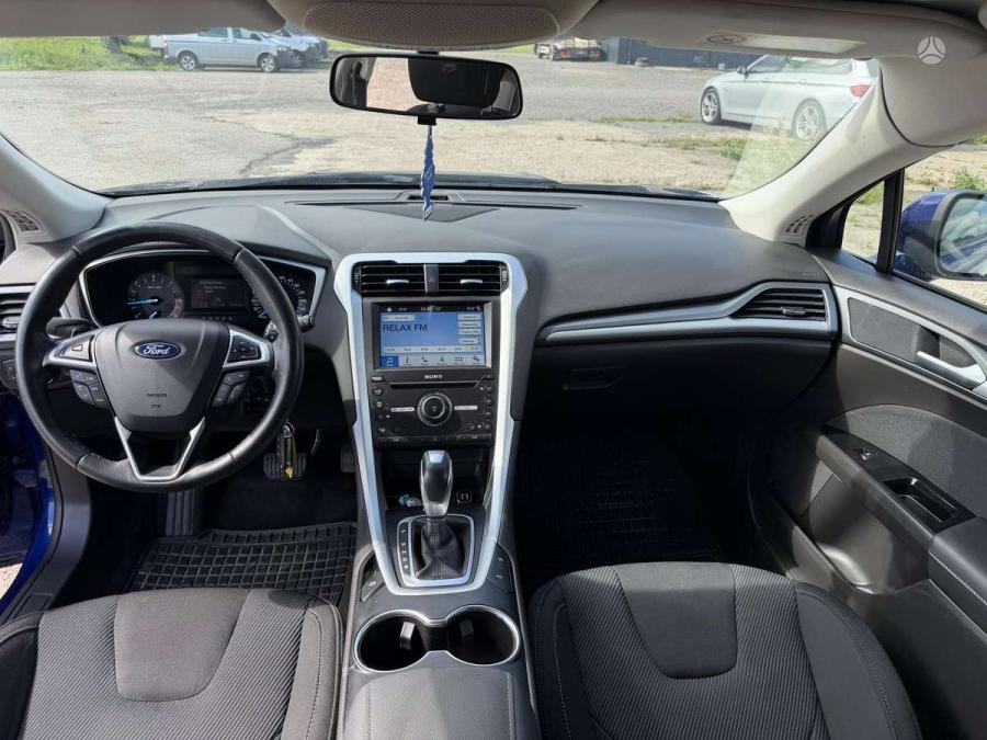 Blue Ford Mondeo 2017 in Vilnius, with an engine capacity of 2.00 L and mileage of 164 thousand km for 7999 €, photo 12 on AUTOMOTO.COM.LV