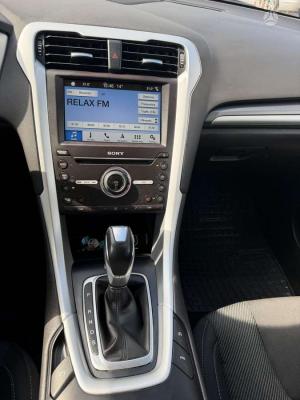 Blue Ford Mondeo 2017 in Vilnius, with an engine capacity of 2.00 L and mileage of 164 thousand km for 7999 €, photo 13 on AUTOMOTO.COM.LV