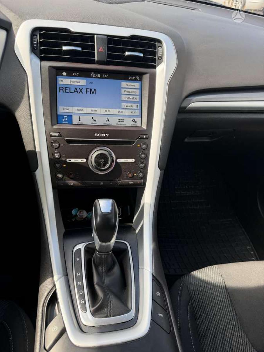 Blue Ford Mondeo 2017 in Vilnius, with an engine capacity of 2.00 L and mileage of 164 thousand km for 7999 €, photo 13 on AUTOMOTO.COM.LV