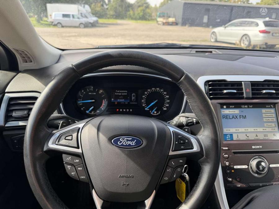 Blue Ford Mondeo 2017 in Vilnius, with an engine capacity of 2.00 L and mileage of 164 thousand km for 7999 €, photo 14 on AUTOMOTO.COM.LV